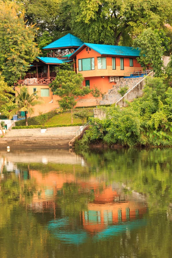 House near the river stock photo. Image of residential - 44033202