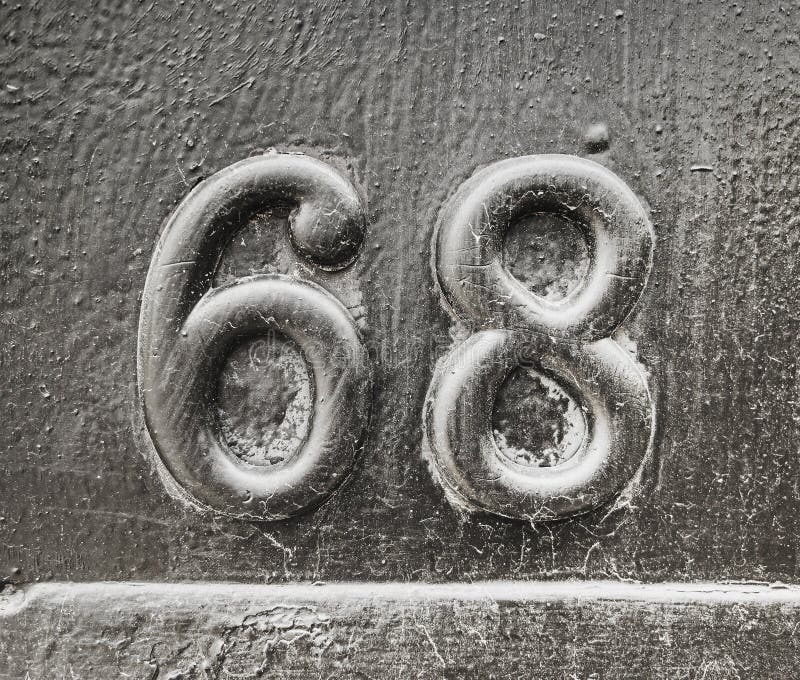 No 68 stock image. Image of gray, closeup, worn, numbers - 194350865