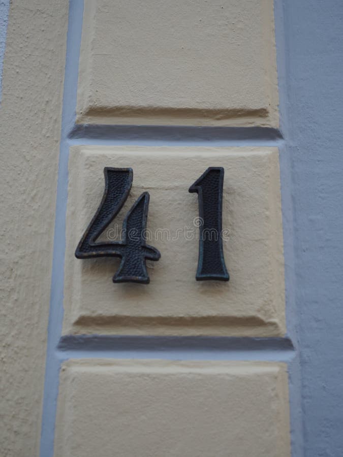 House Number 41, Black Numbers on a Cream-colored Wall Stock Image ...