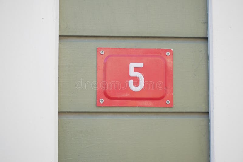 House Number Five on a Green Wall in Bright Daylight Stock Image ...