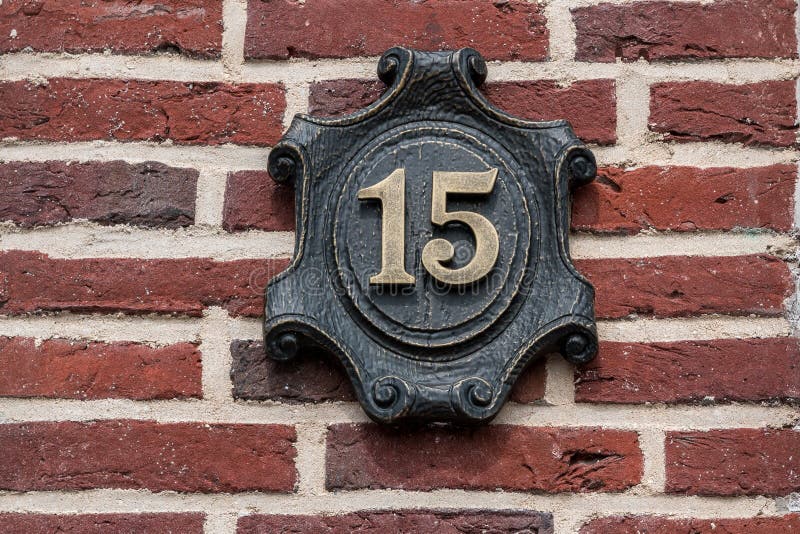 House Number Made of Metal on a Brick Wall Stock Photo - Image of ...