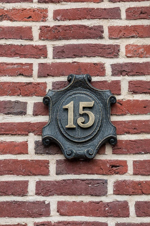 House Number Made of Metal on a Brick Wall Stock Image - Image of ...