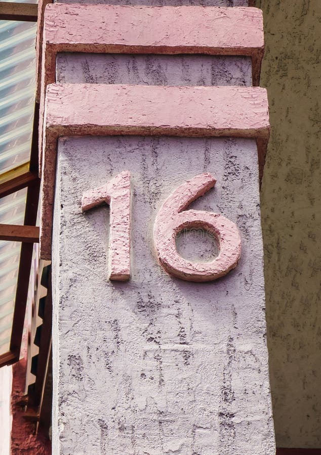 House Number 16 on the Pink Column in Front of the House Stock Photo ...
