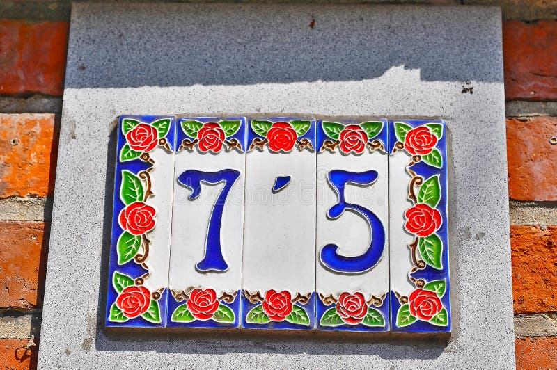 A House Number Plaque, Showing the Number Seventy Five 75 Stock Photo ...