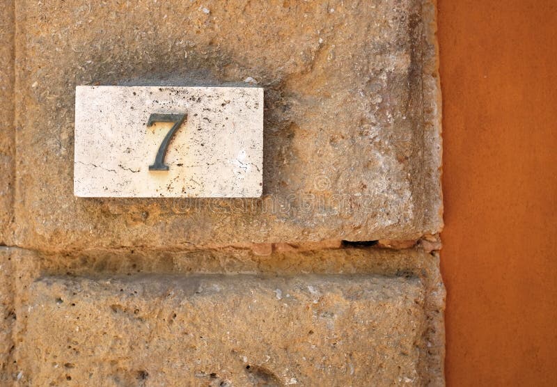 House number on wall stock image. Image of indication - 90361537