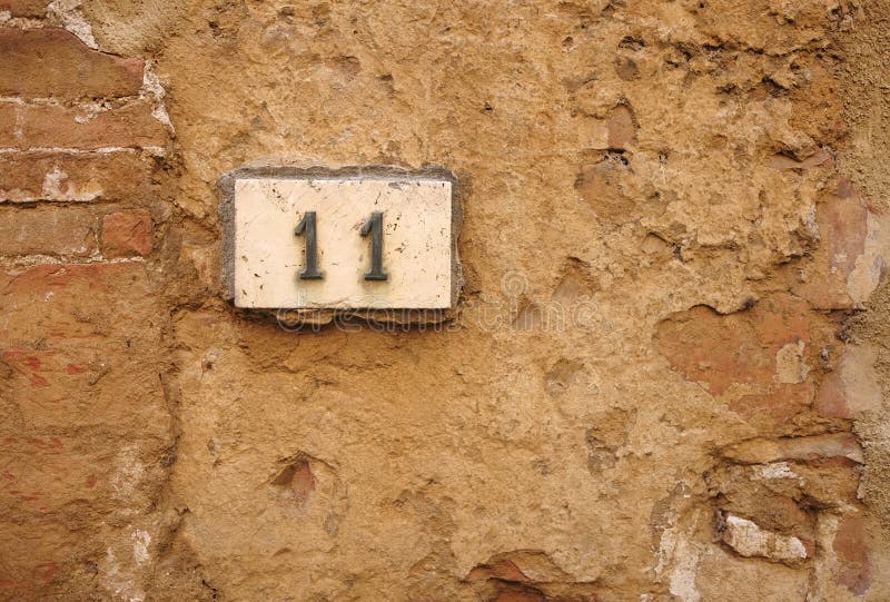 House number on wall stock image. Image of weathered - 90361943