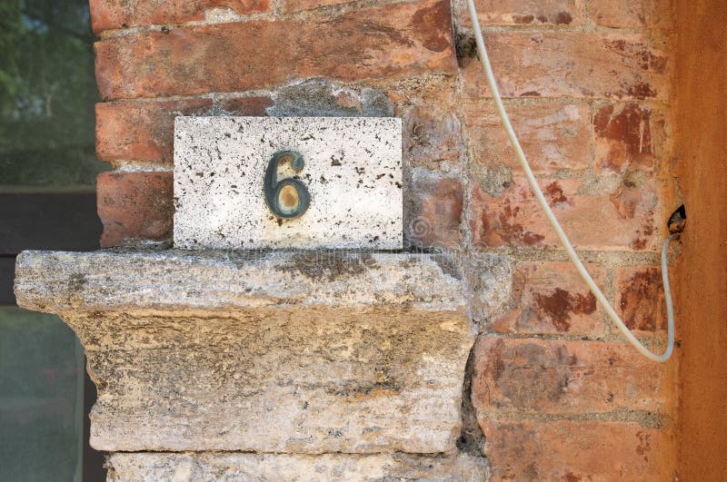 House number on wall stock photo. Image of indicator - 90362480