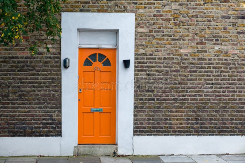 House with orange door stock image. Image of front, home - 9219561