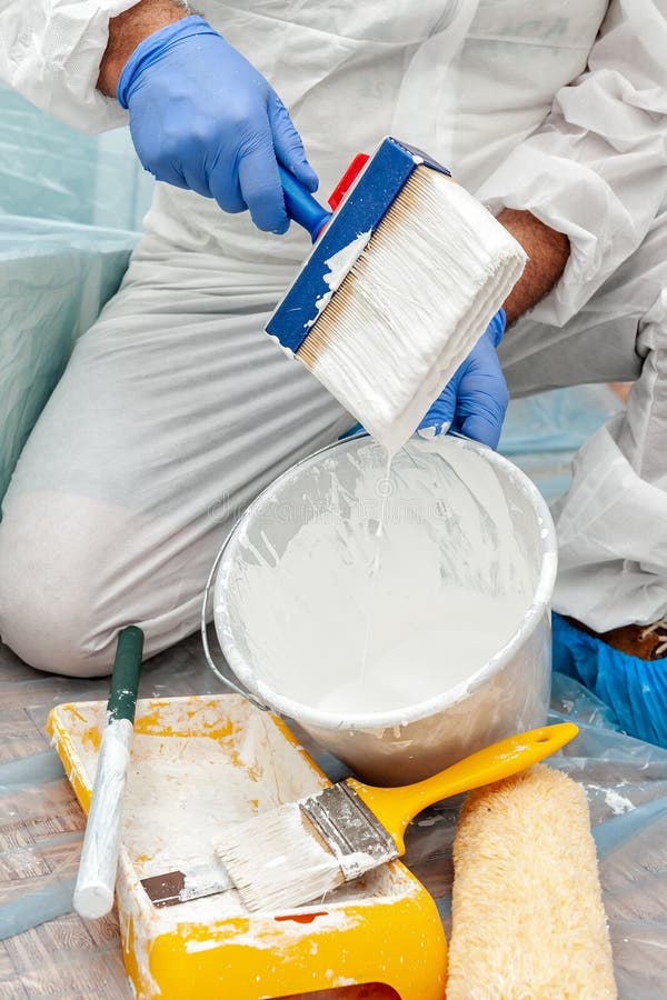 House Painter at Work Prepares White Paint Stock Photo - Image of ...