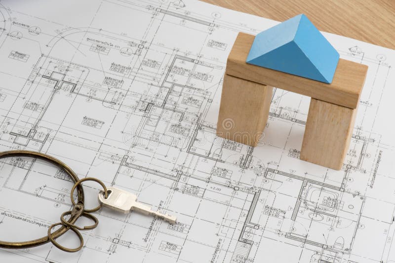 House Plan with Toy Wood Block Model and a Key with Vintage Ring Stock ...