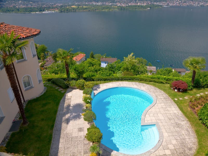 House with pool over lake stock photo. Image of luxury - 16255090