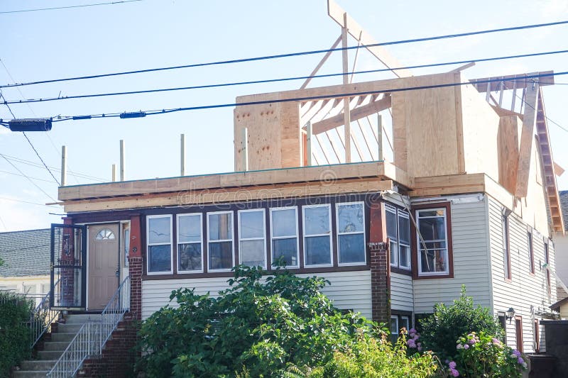 House that is in the Process of Having a Second Floor Built Onto it ...