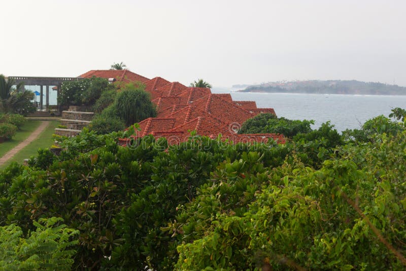 House with Red Roof on the Beach Stock Photo - Image of landscape ...