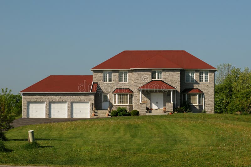 Triple Garage with an Apartment Upstairs Stock Photo - Image of ...