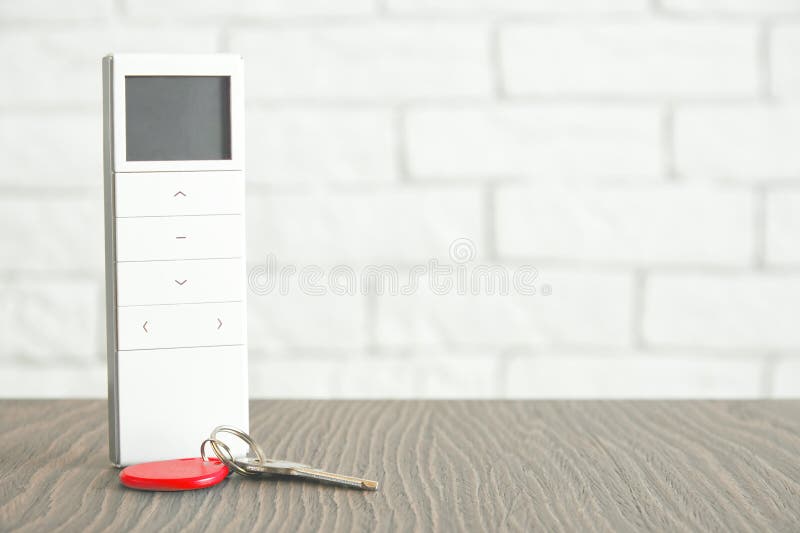 House Remote Controller with Display and Metallic Keys from the Door ...