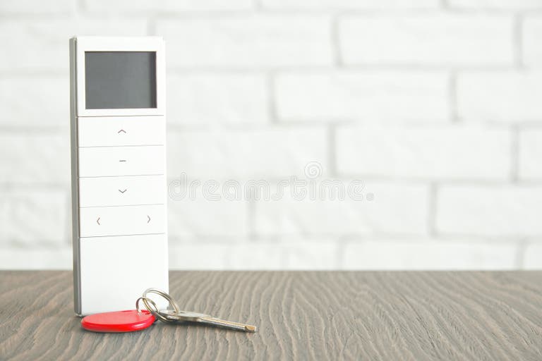 House Remote Controller with Display and Metallic Keys from the Door ...