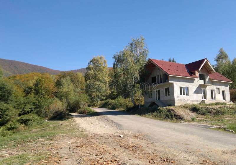 House on the roadside stock photo. Image of estate, field - 56578774