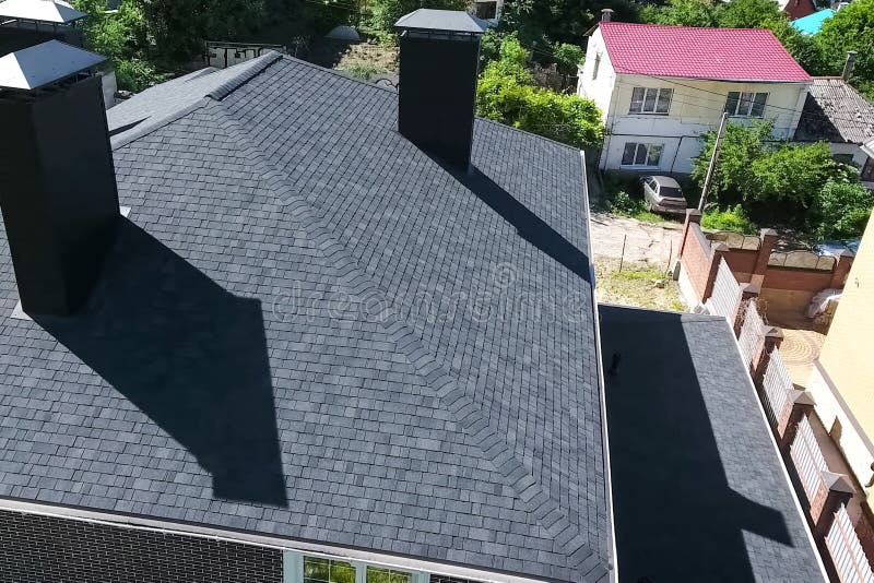 Bituminous Tile for a Roof. House with a Roof from a Bituminous Stock ...