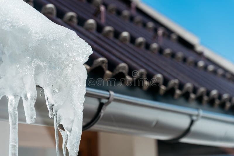 House Roof Tiles Under Snow in Winter Stock Photo - Image of snow ...