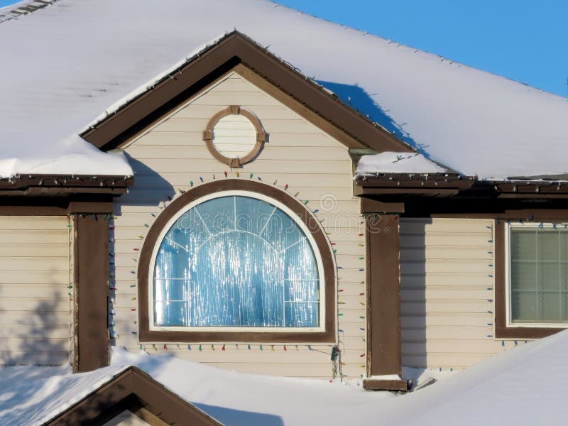 A House with a RV Thermal and Reflective Window Cover during the Winter ...