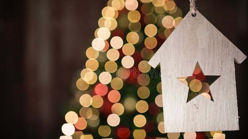 House Shape on Christmas Tree Stock Photo - Image of bliurred, holiday ...