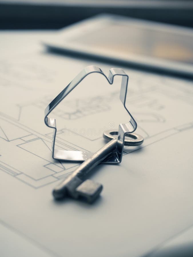 House Shape with a Key on Construction Plan Stock Photo - Image of move ...