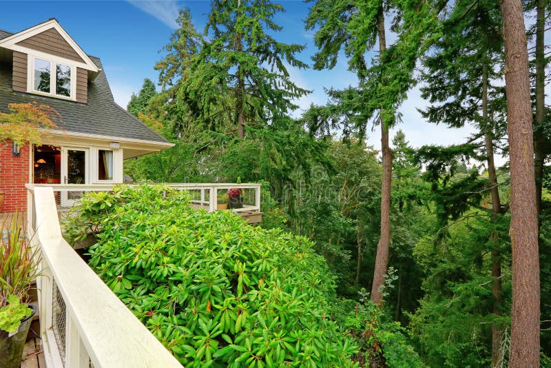 House with Spacious Walkout Deck Overlooking Amazing Landscape Stock ...