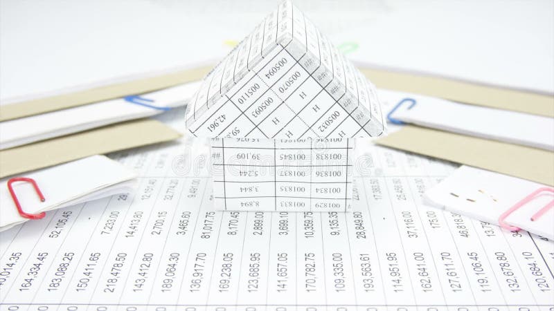 House between Stack Paperwork Report with Envelope on Table Time Lapse ...