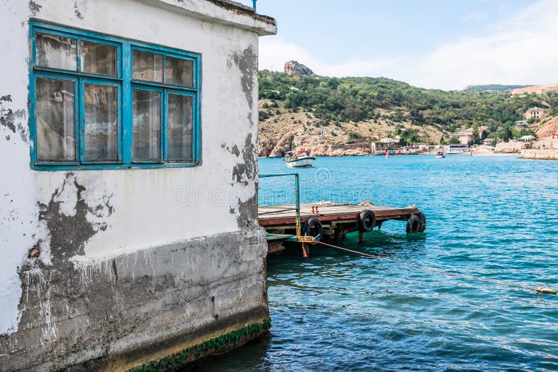 House standing in the sea stock image. Image of wood - 178414873