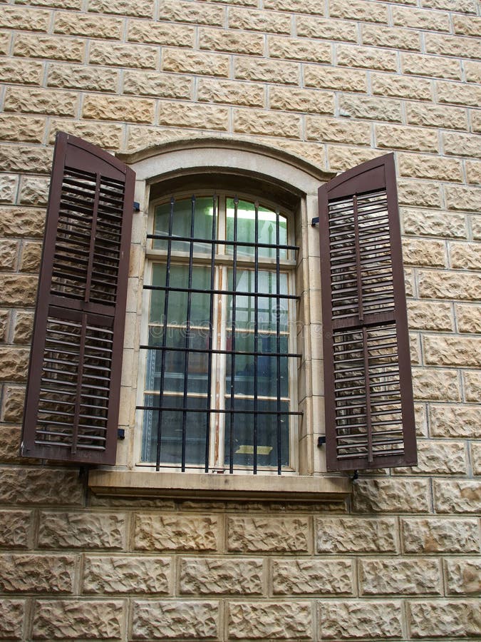 House Stone Wall with Window with Classical Wooden Shutters Stock Photo ...