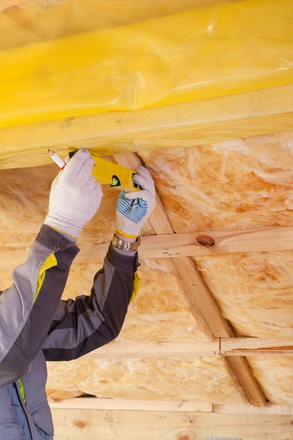 Professional Worker Using Measuring Level, Checking Ceiling Surface ...