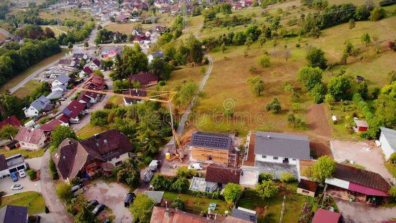 House Under Construction. Small Construction Crane at Construction Site ...