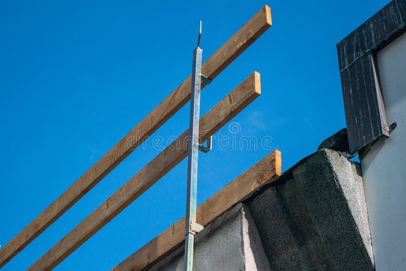 House Under Renovation with Railing for Construction Site on the Facade ...