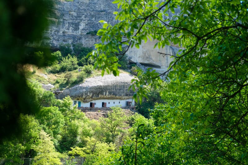 House Under the Rock. Cave House Stock Photo - Image of dwelling, city ...
