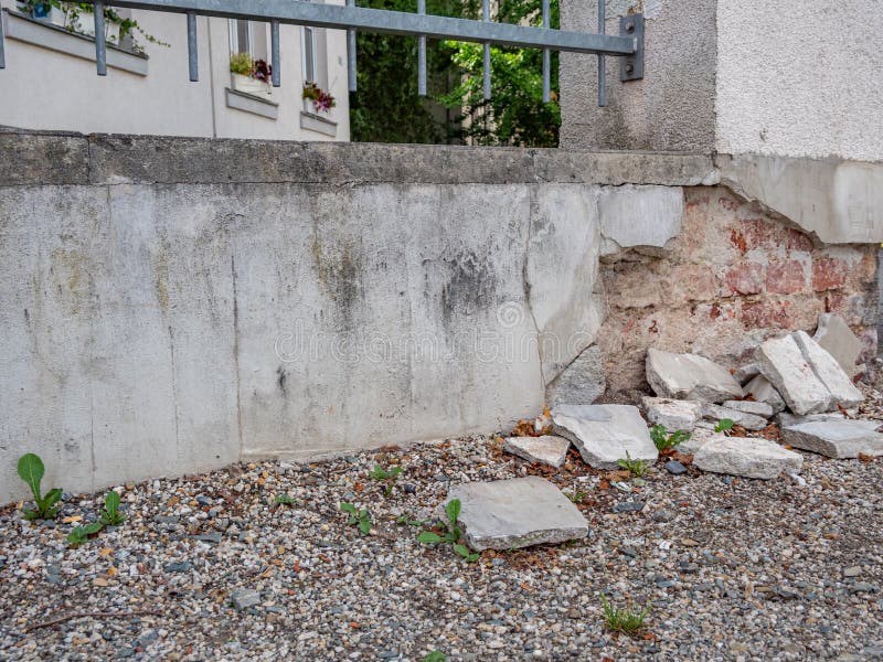 House Wall with Structural Damage in the Wall Plaster Stock Photo ...