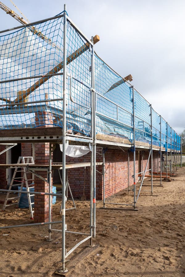 On the House Wall There is Scaffolding on a Construction Site Stock ...