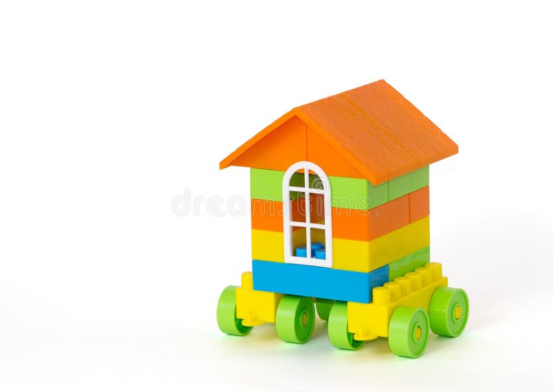 House on Wheels Made of Plastic Bricks. Isolated on White Background ...