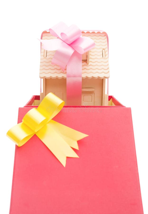 House Wrapped with Ribbon Besides a Present Box Stock Photo - Image of ...