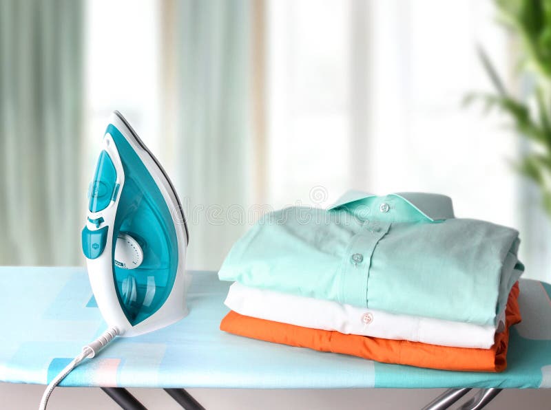 Household Concept.Ironing Board with Clothes. Stock Image - Image of ...