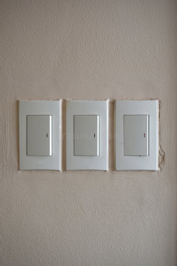 Household Light Switch on the Wall. White Plastic Switch Stock Image ...
