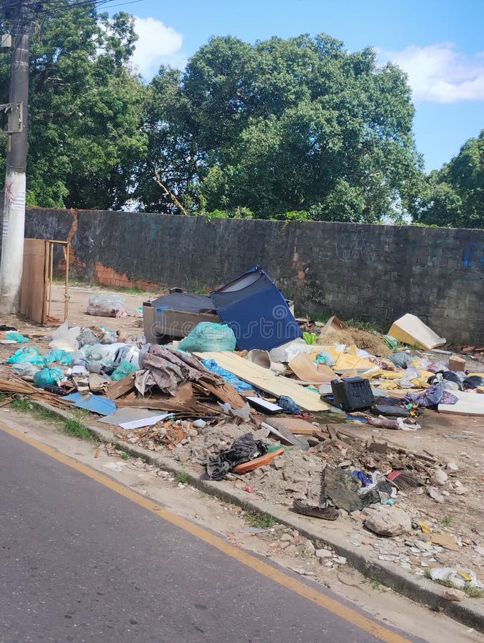 Household Waste Discarded on the Side of the Urban Street Stock Photo ...