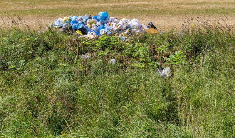 Household waste on field stock image. Image of ecology - 155450119