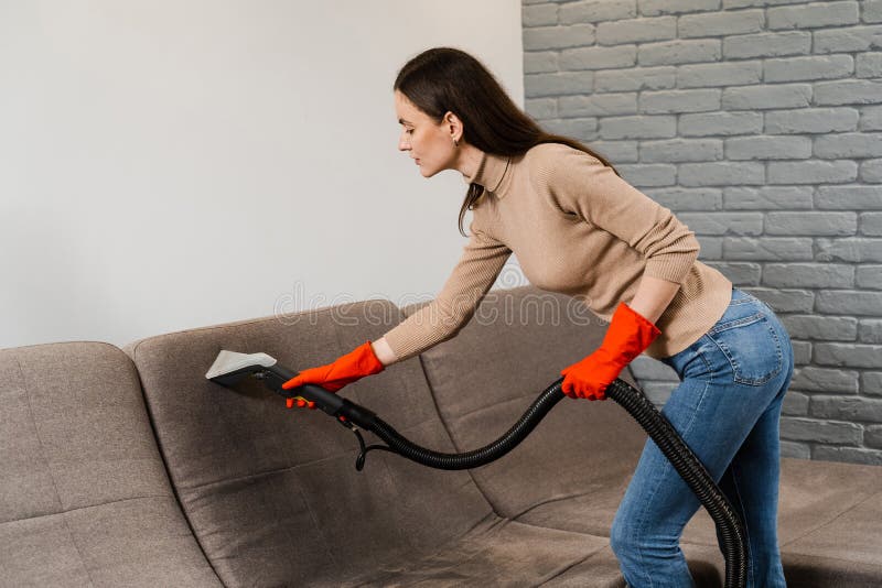 Housekeeper is Extracting Dirt from Upholstered Sofa Using Dry Cleaning ...