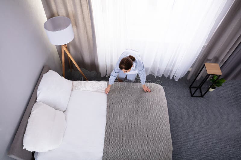 Housekeeper Making Bed in Hotel Room Stock Image - Image of interior ...