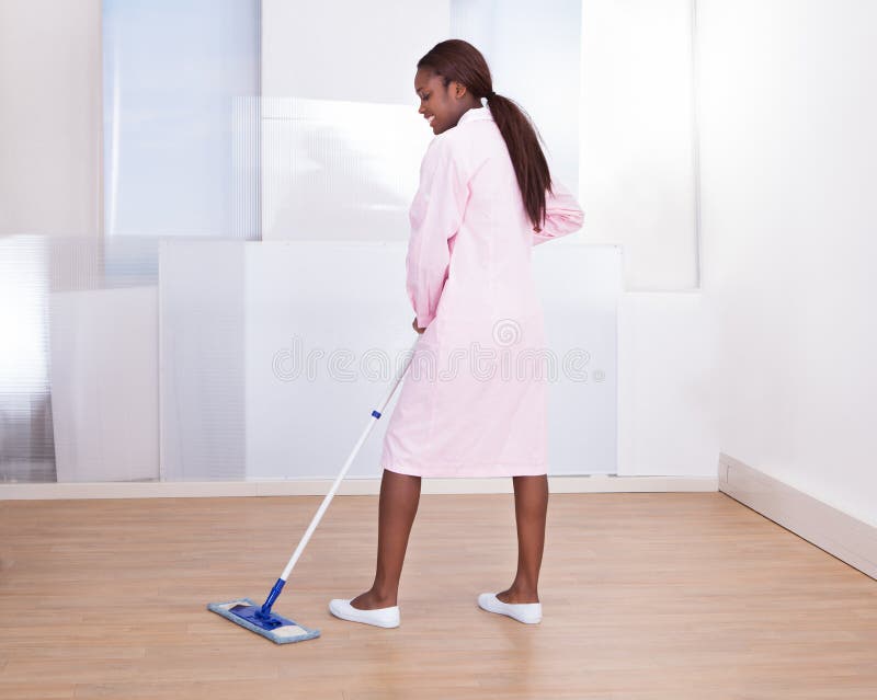 Maid Mopping Floor