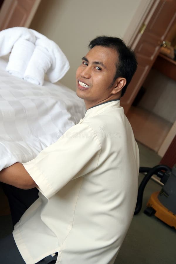 Housekeeping in action stock image. Image of male, asian - 5310337