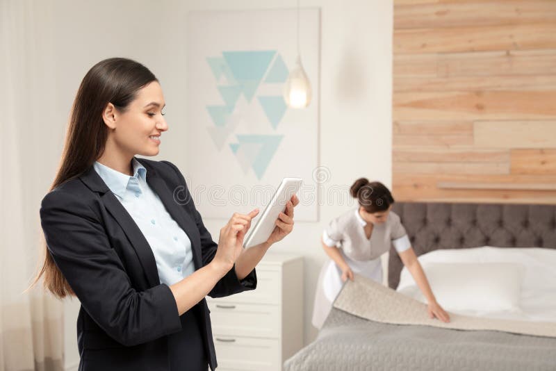 Housekeeping Manager Checking Maid Work Stock Photo - Image of manager ...