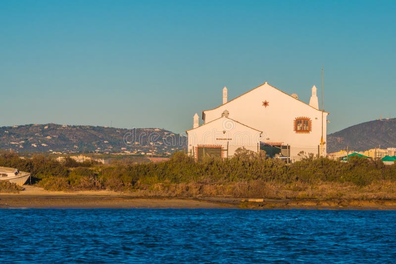 Houses around Faro Beach editorial stock image. Image of city - 194774449
