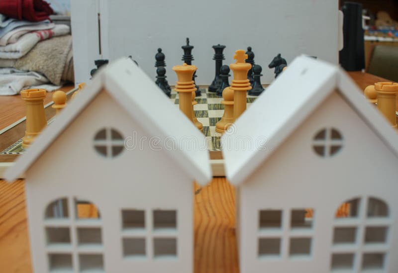Houses and Chess Pieces in a Chessboard Stock Photo - Image of union ...