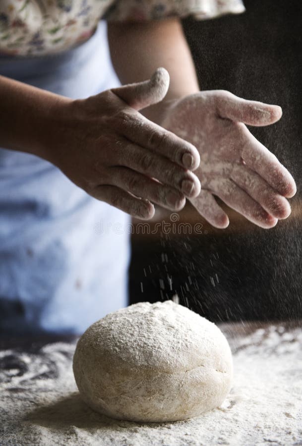 A housewife making a dough stock image. Image of break - 116844743